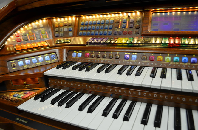 Lowrey Imperial organ, warm oak cabinet